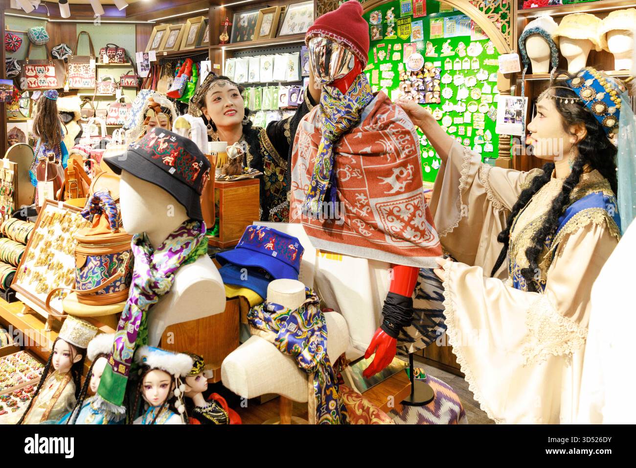 Tourists visit the Grand Bazaar in Urumqi City, northwest China's ...