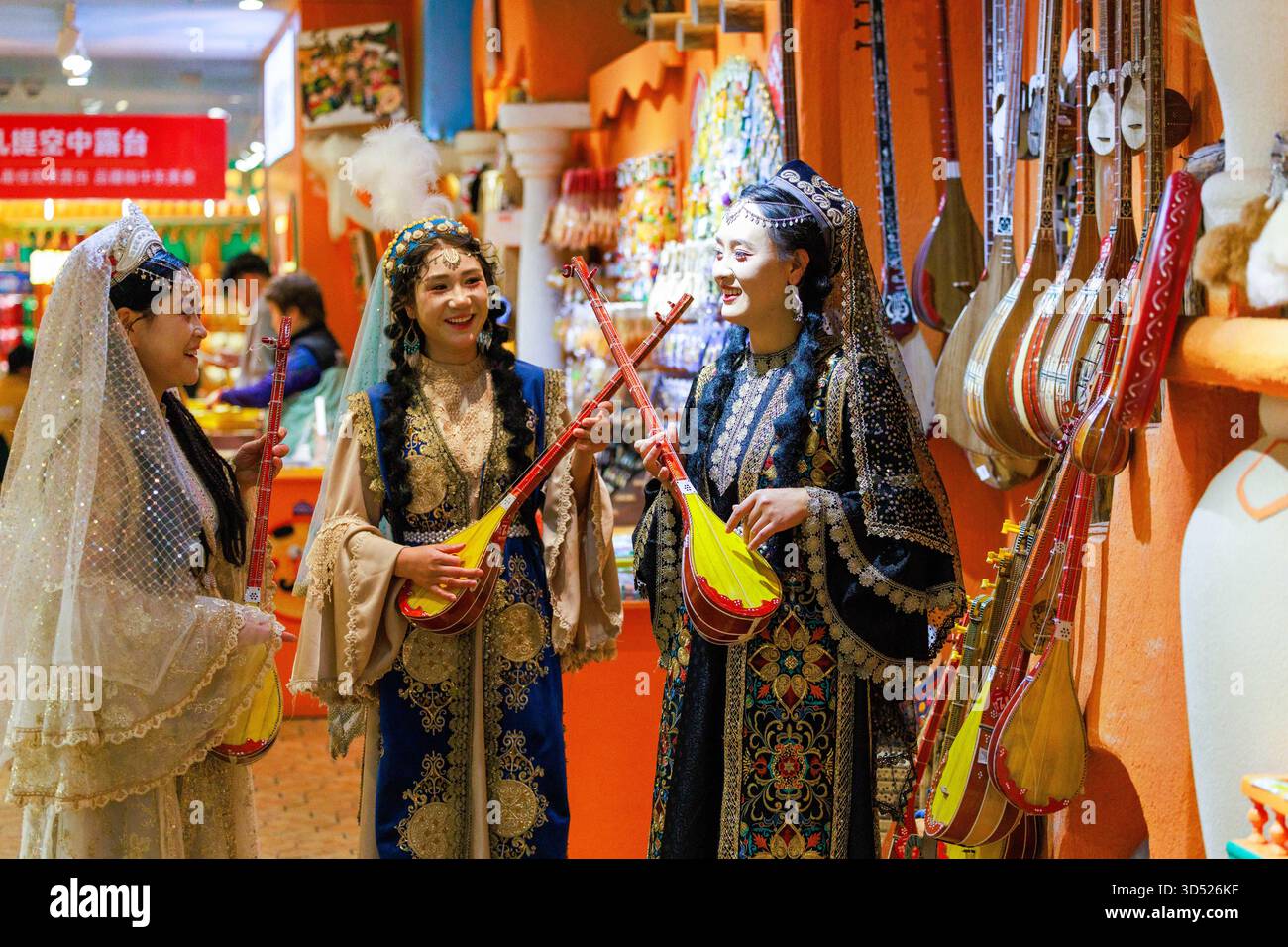 Tourists visit the Grand Bazaar in Urumqi City, northwest China's ...