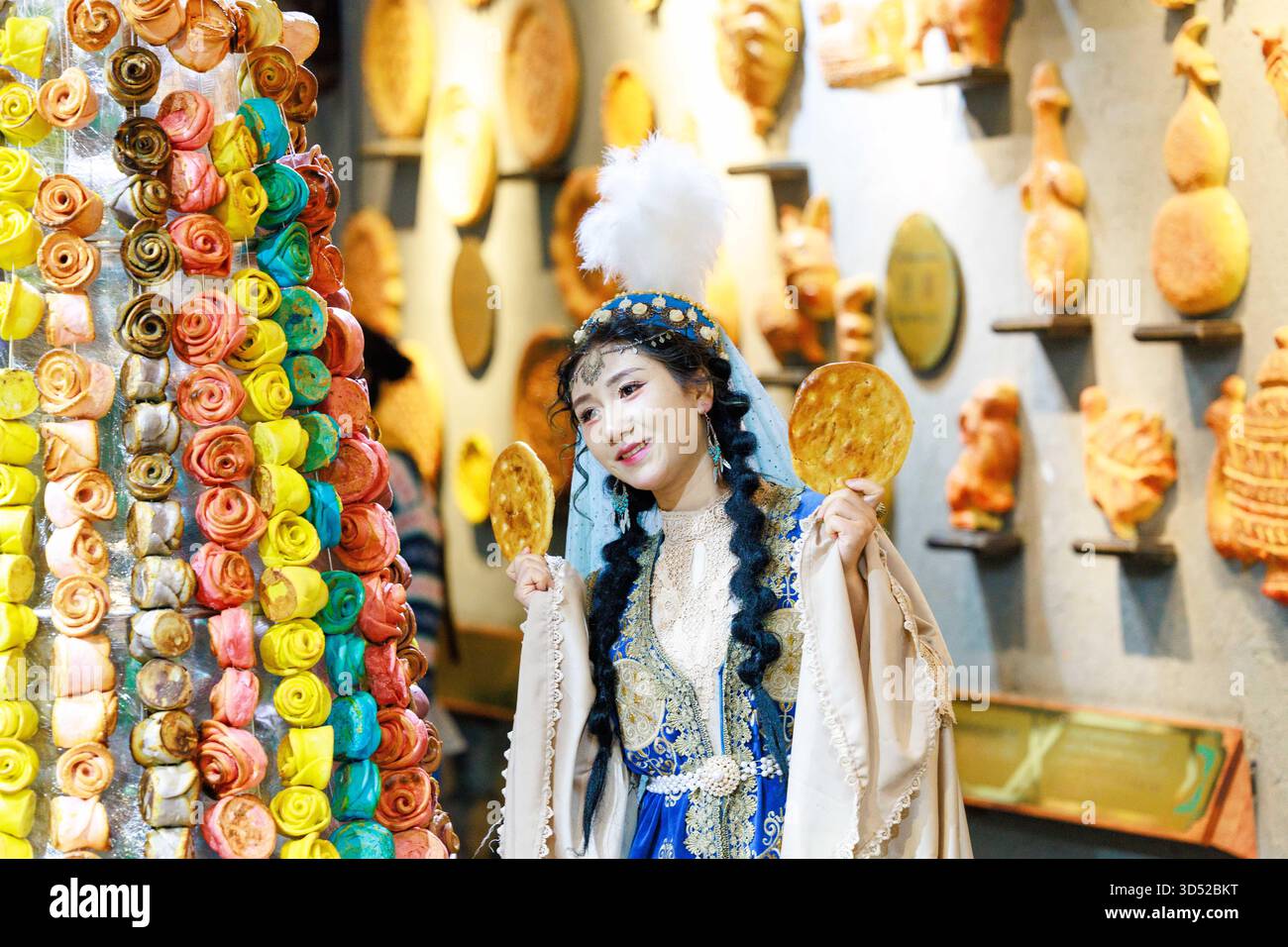 Tourists visit the Grand Bazaar in Urumqi City, northwest China's ...