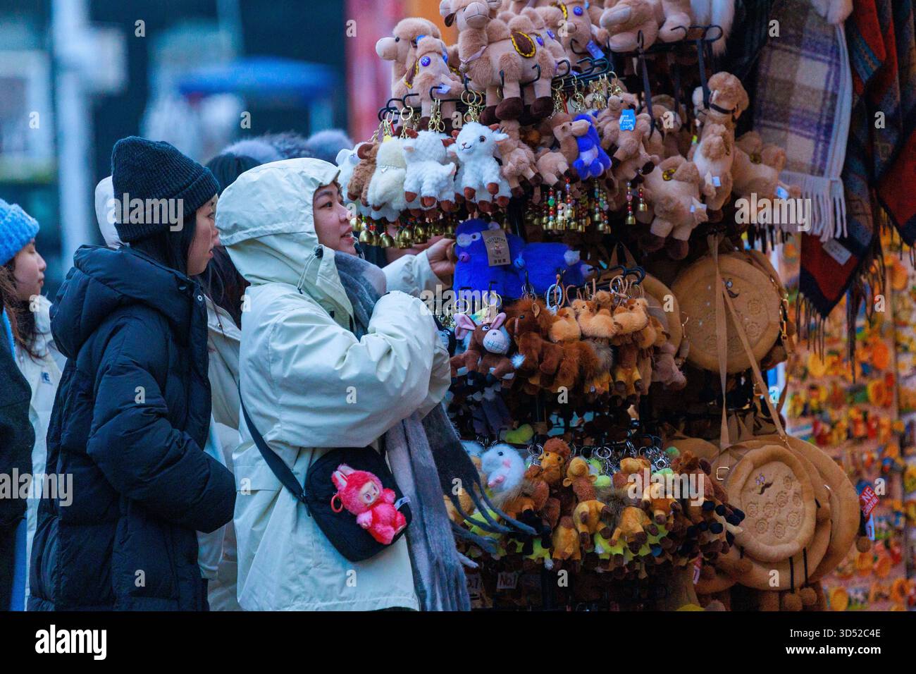 Tourists visit the Grand Bazaar in Urumqi City, northwest China's ...