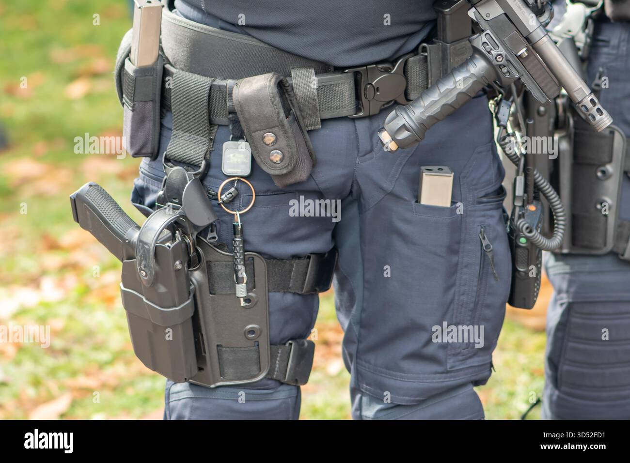 Man wearing security uniform stands hi-res stock photography and images ...