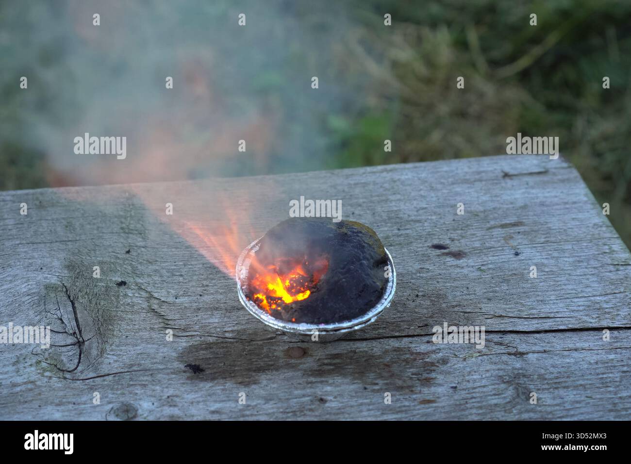 Burning chemical in the cup. Burning chemical Stock Photo - Alamy