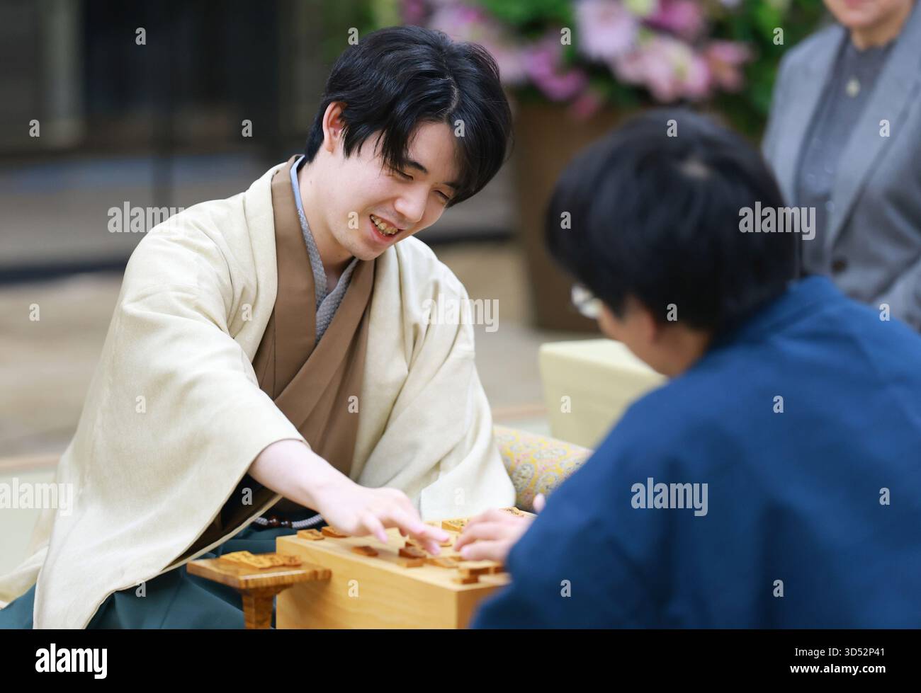 Sota Fujii (L), a Japanese professional shogi player, Ryuo, and Meijin ...