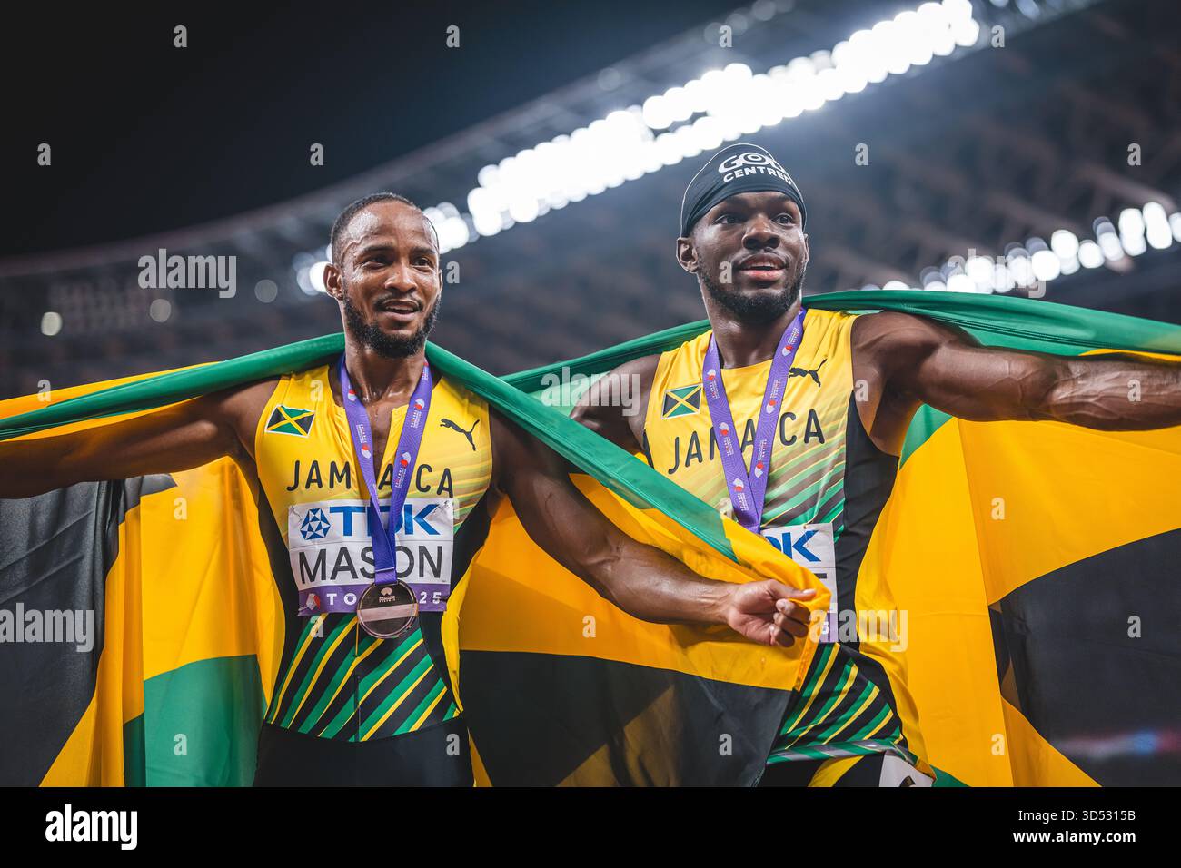 Tyler Mason and Orlando Bennett celebrating her medal with her country ...