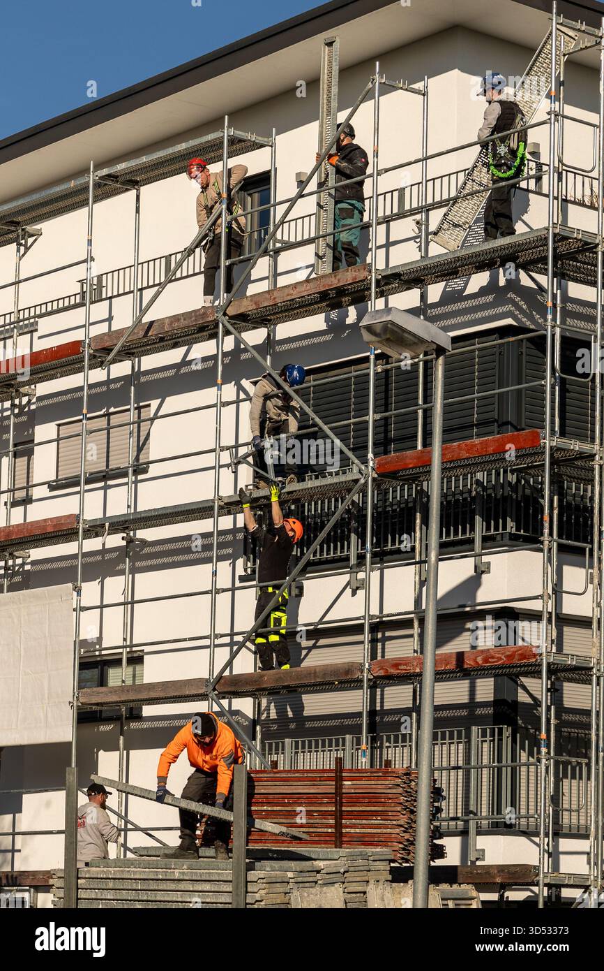 Neuwied, Germany - November 7, 2025: Construction workers are expertly ...