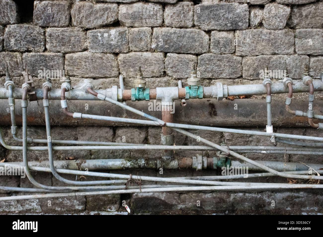 Typical large scale metal water suply pipe for the town and homes in ...