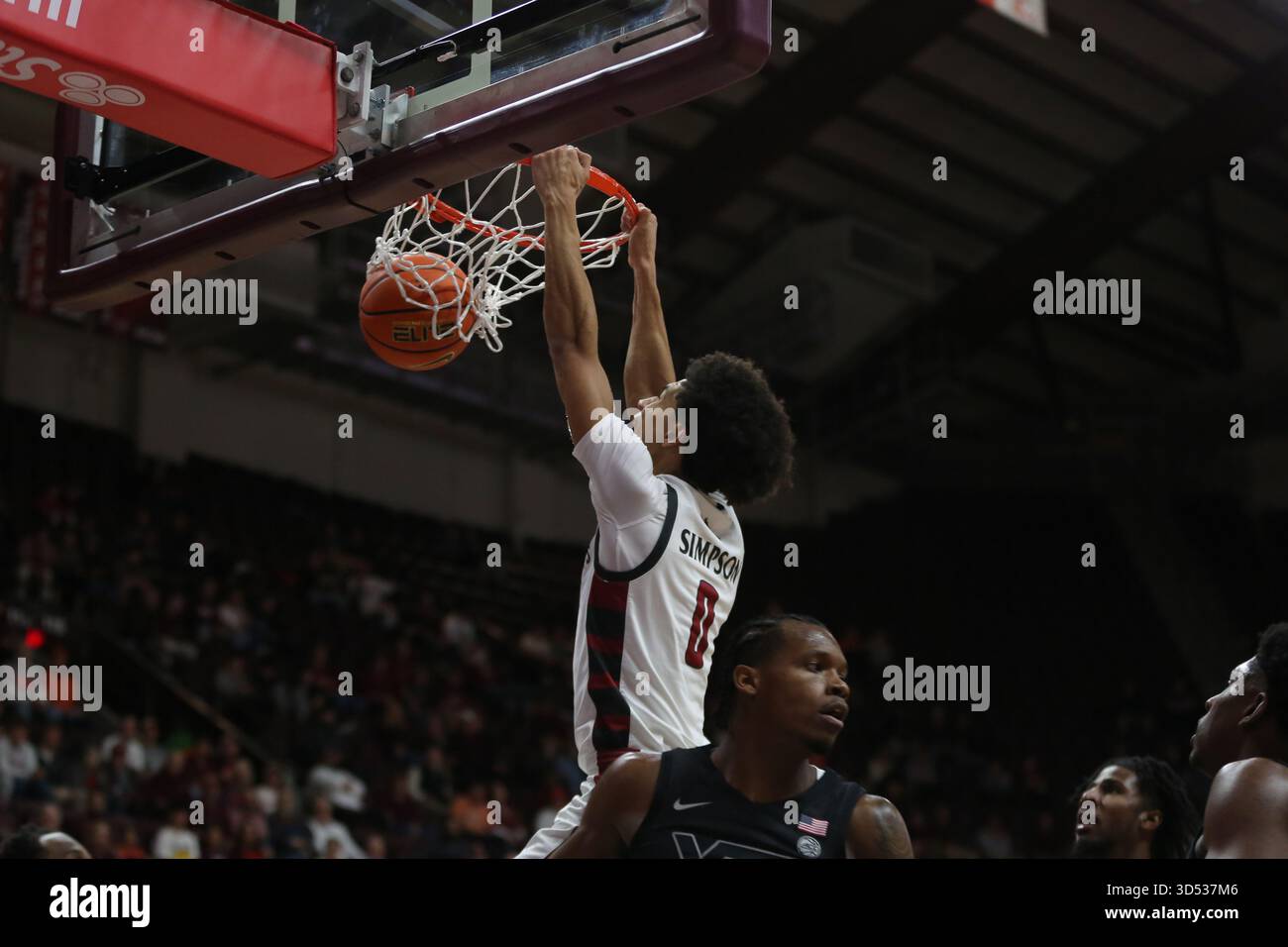Saint Joseph's Hawks guard Derek Simpson (0) dunks the ball at Cassell ...