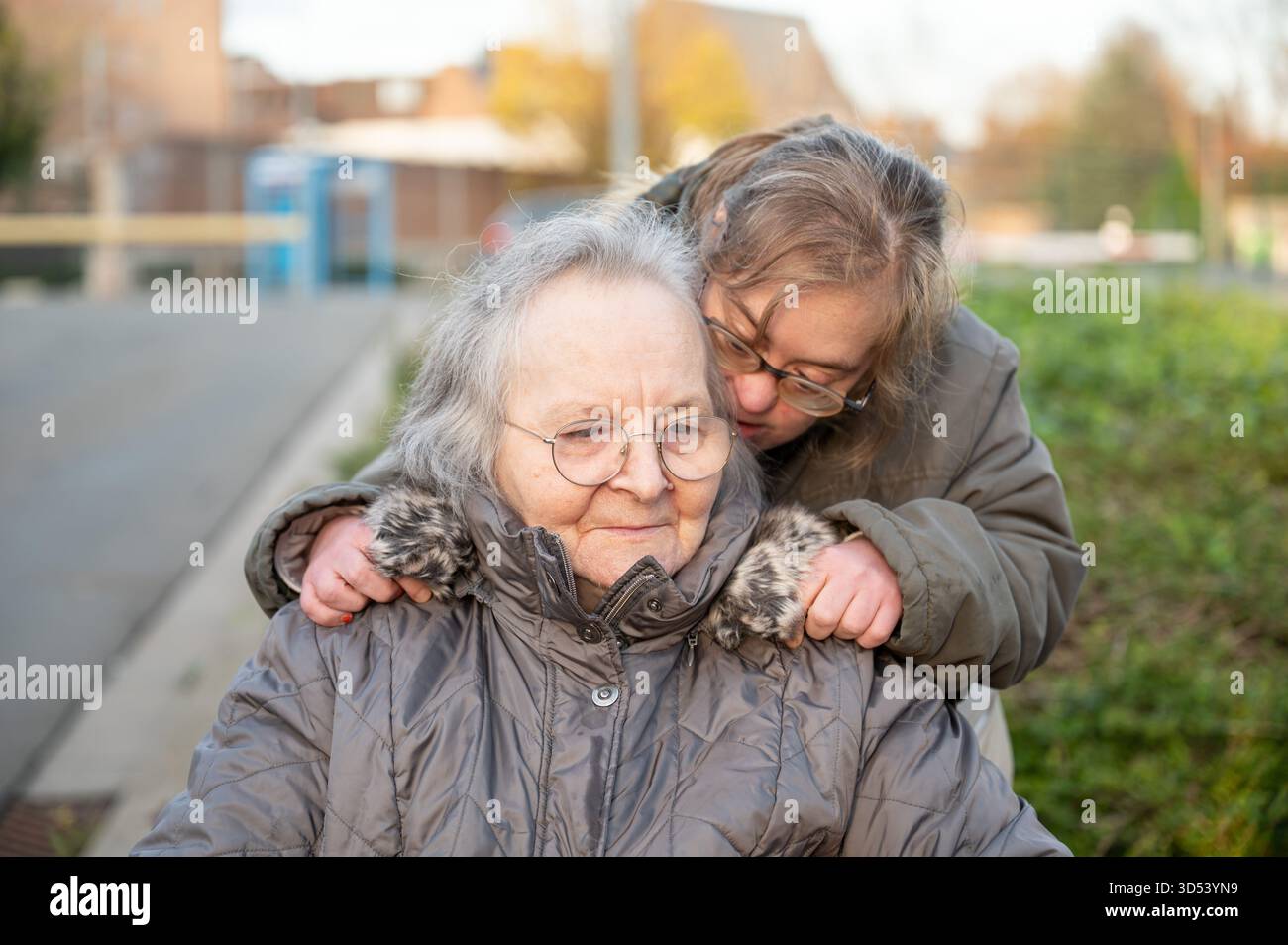 Outdoor portrait of a 43-year-old woman with Down syndrome (trisomy 21 ...
