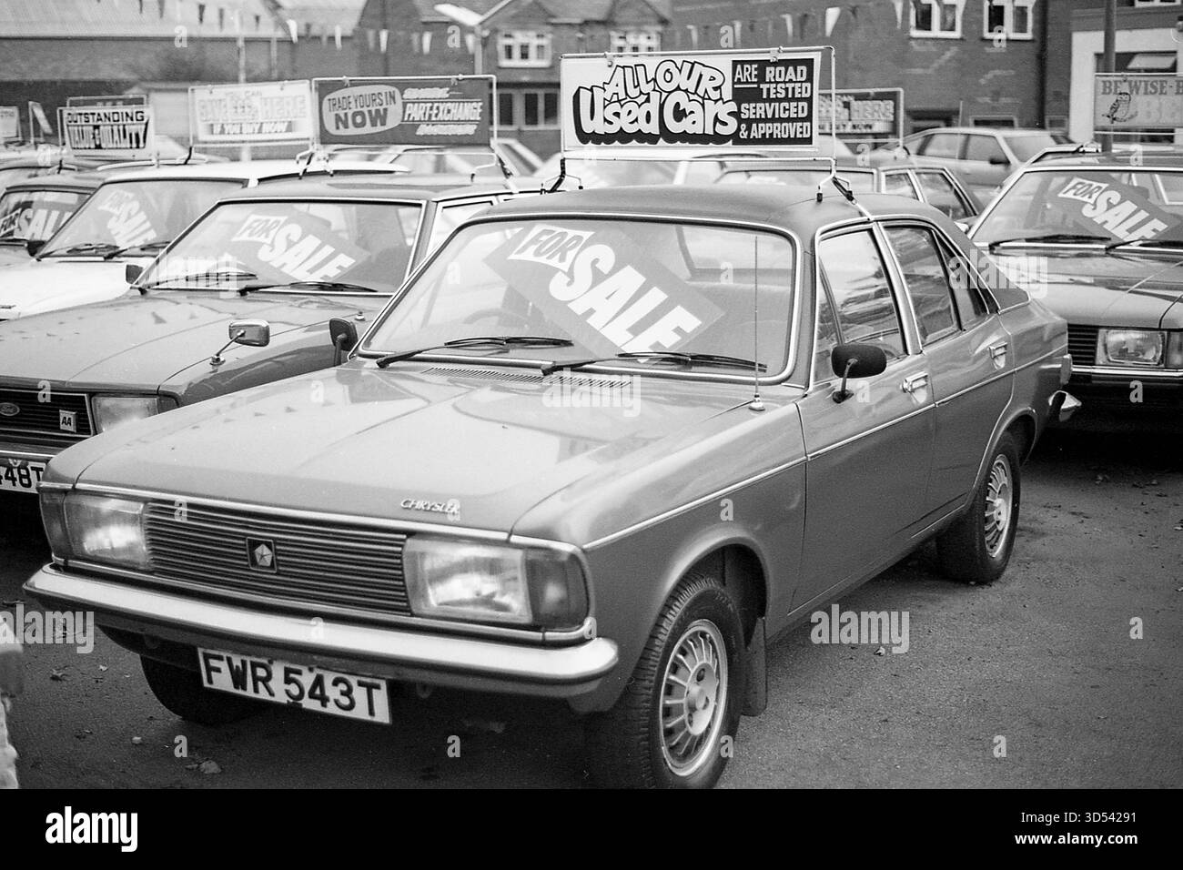 Early 1980's car sales forecourt with second hand late 1970's cars for ...