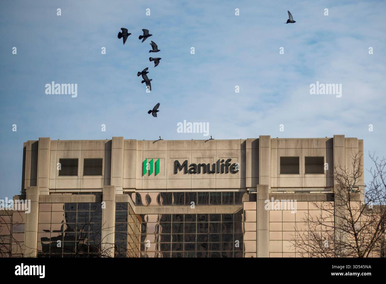 Signage is seen on Manulife Financial Corp.'s office tower in Toronto ...