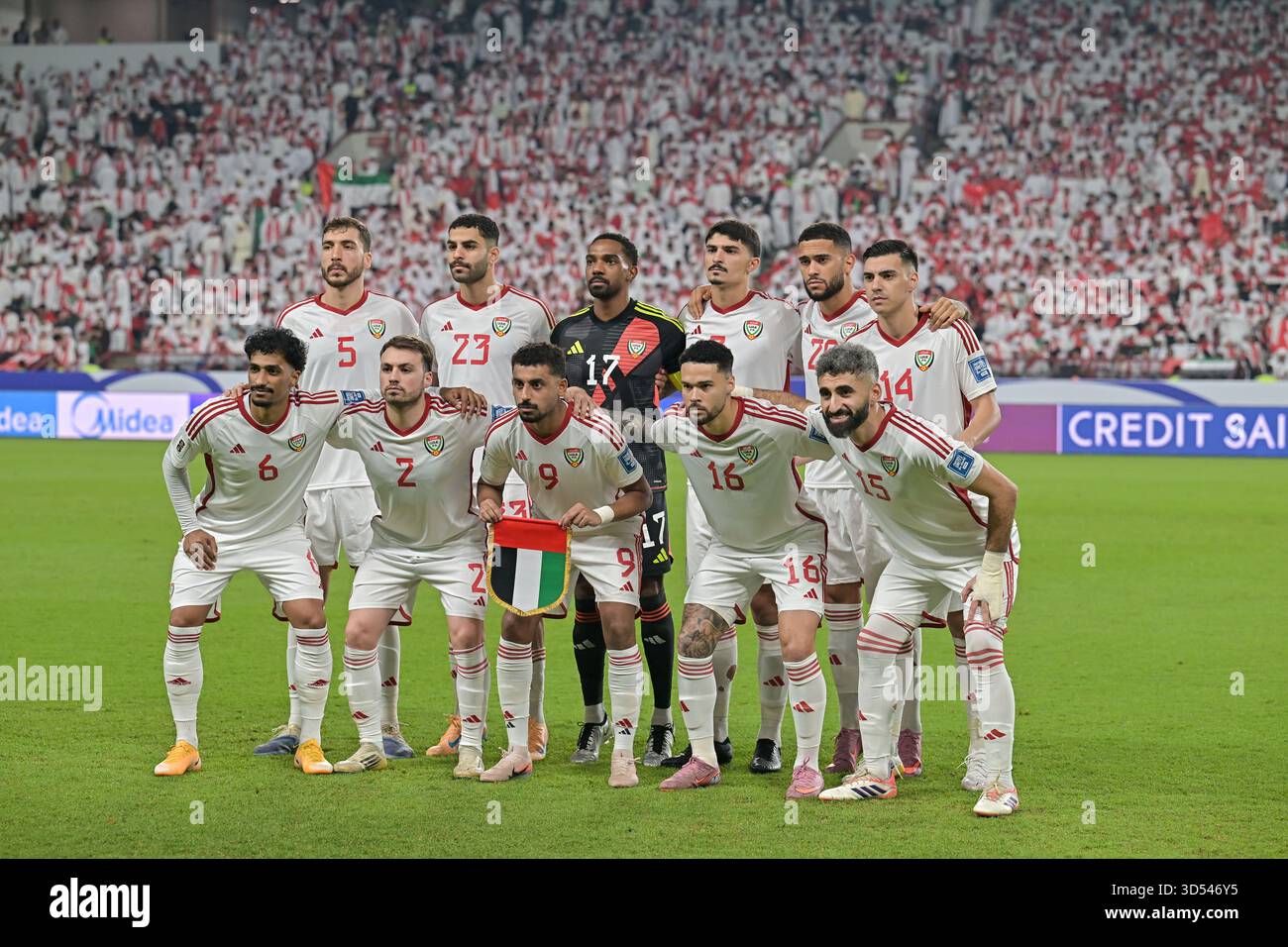 UAE team players pose prior to the start of the national anthem before ...