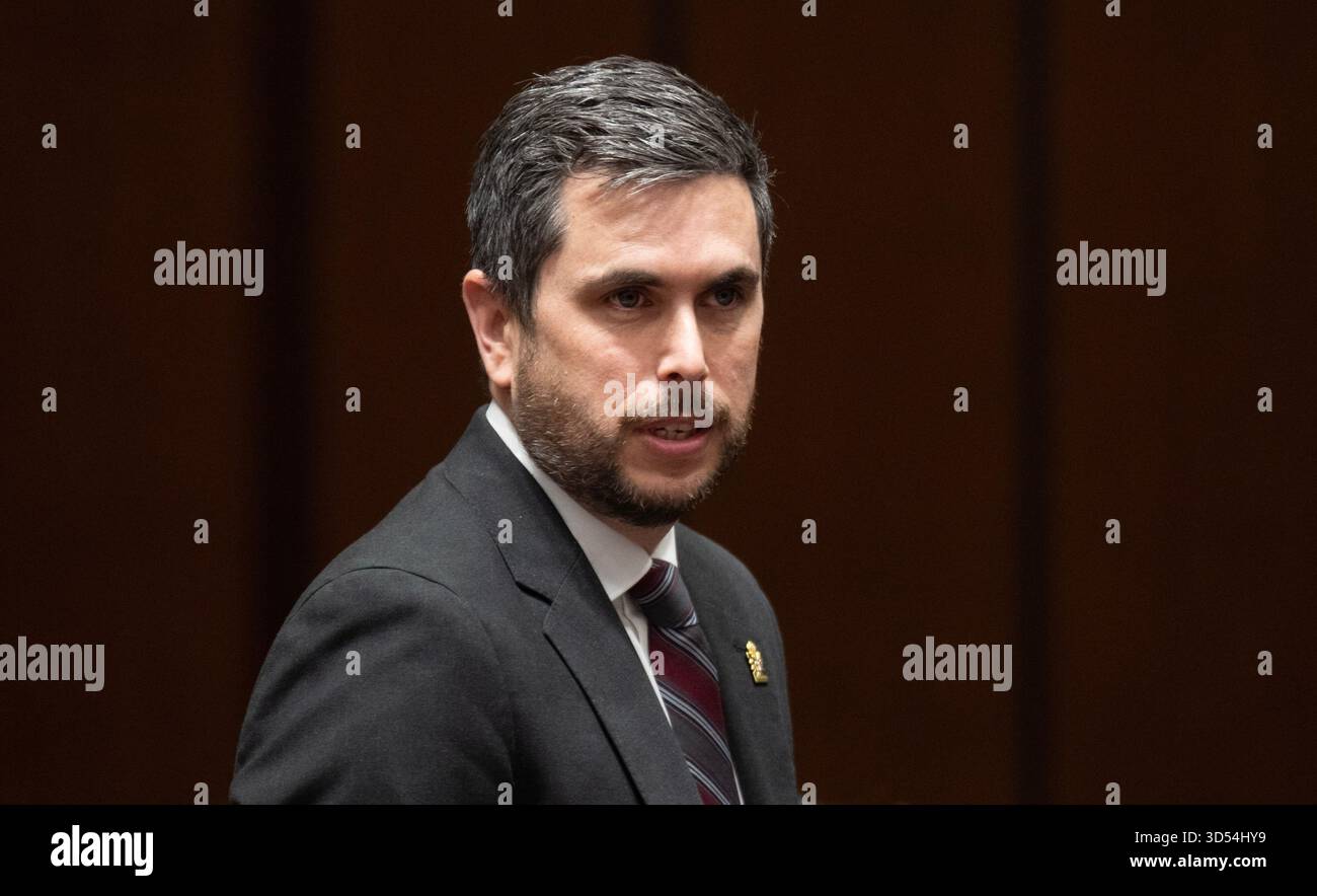 Canadian Security Intelligence Service director Daniel Rogers waits to ...