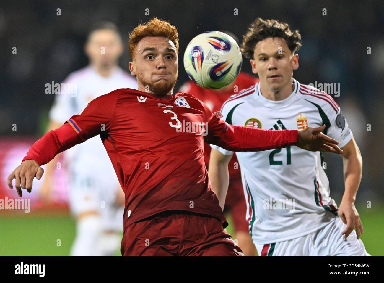 Armenia's Erik Piloyan, left, fights for the ball with Hungary's Alex ...