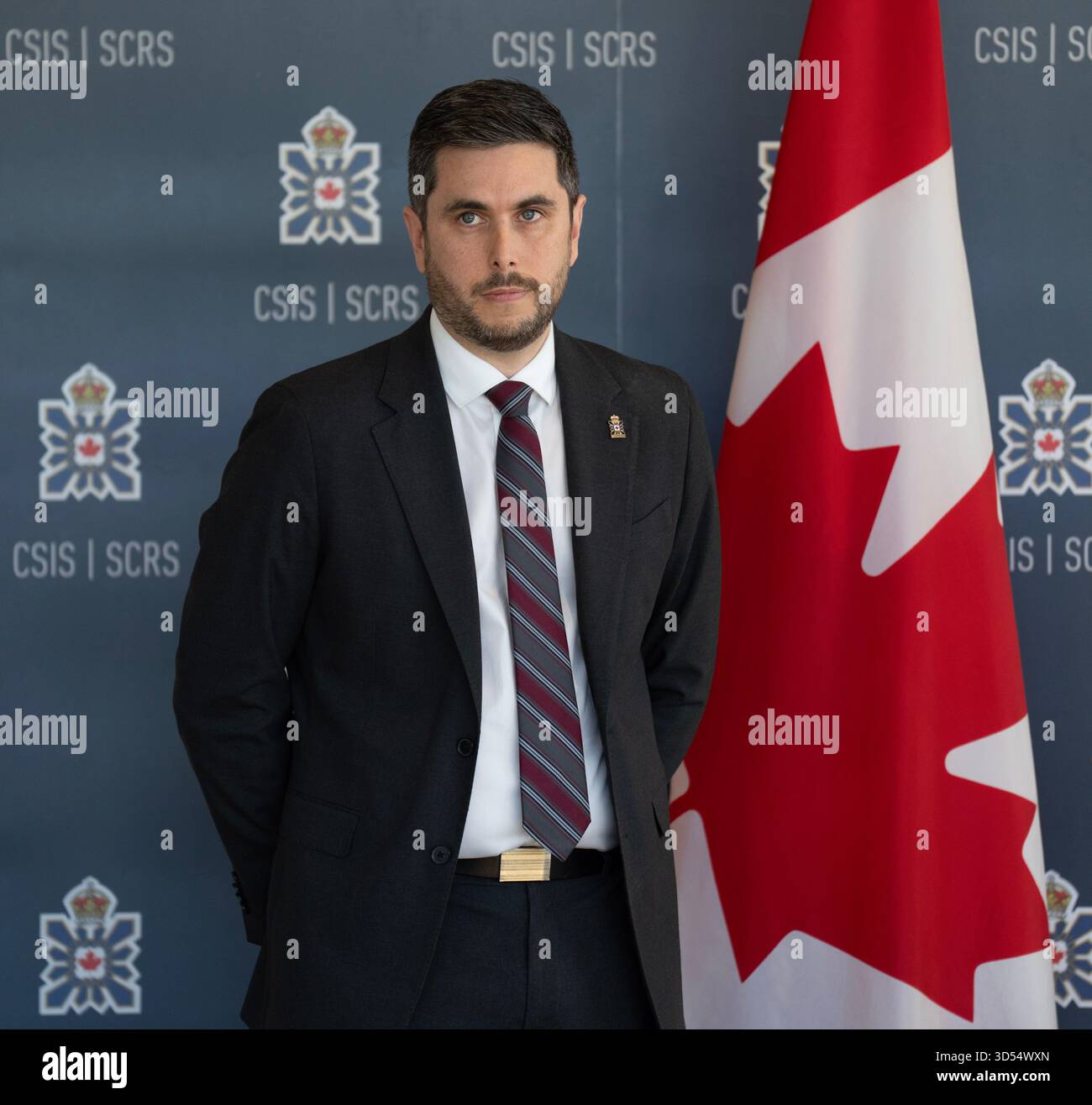 CSIS Director Daniel Rogers is seen as he waits to give a speech in ...