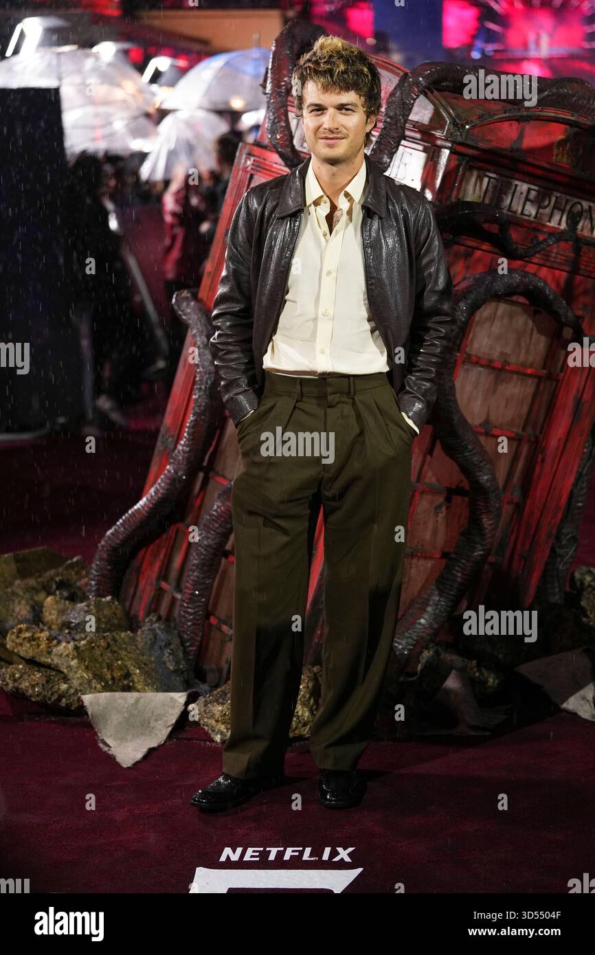 Joe Keery poses for photographers upon arrival at the Stranger Things ...