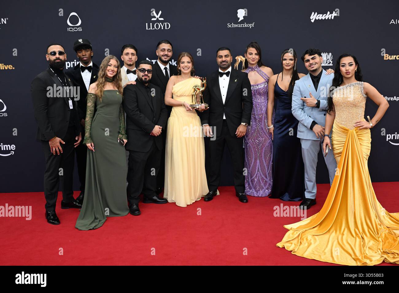 13 November 2025, Bavaria, Grünwald: Zah1de (M) shows her BAMBI, in the ...