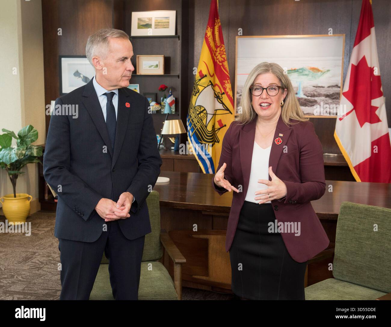 Prime Minister Mark Carney left, meets with New Brunswick Premier Susan ...