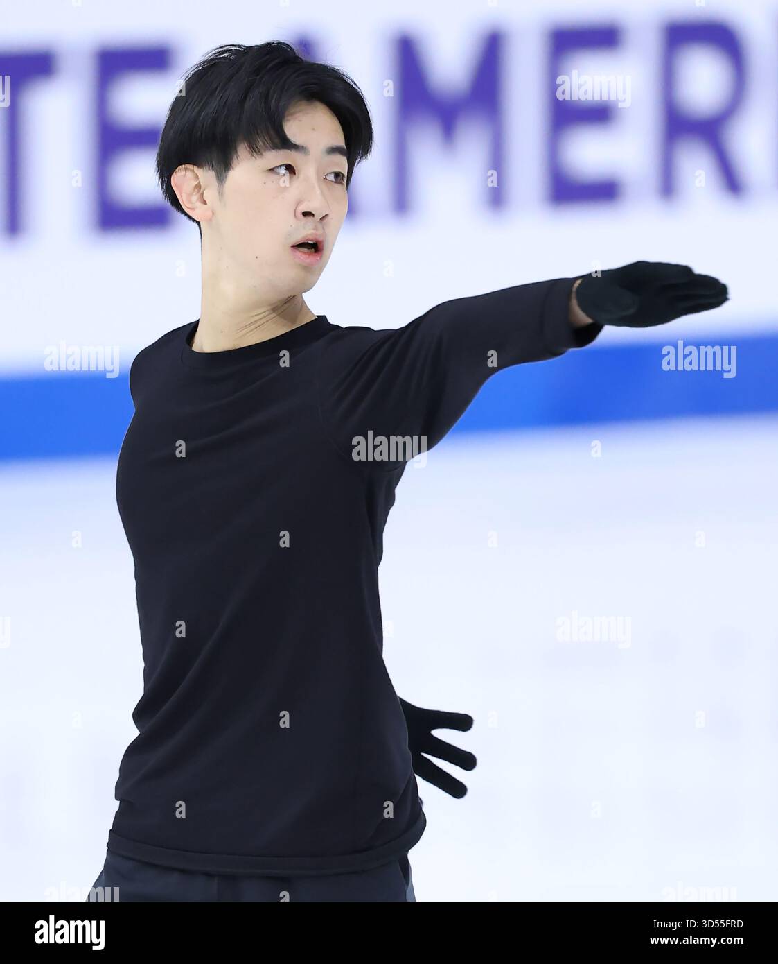 Tatsuya TSUBOI of Japan practices for the men's figure skating in the ...