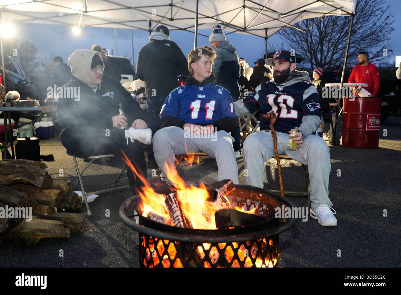 New England Patriots fans tailgate ahead of an NFL football game ...