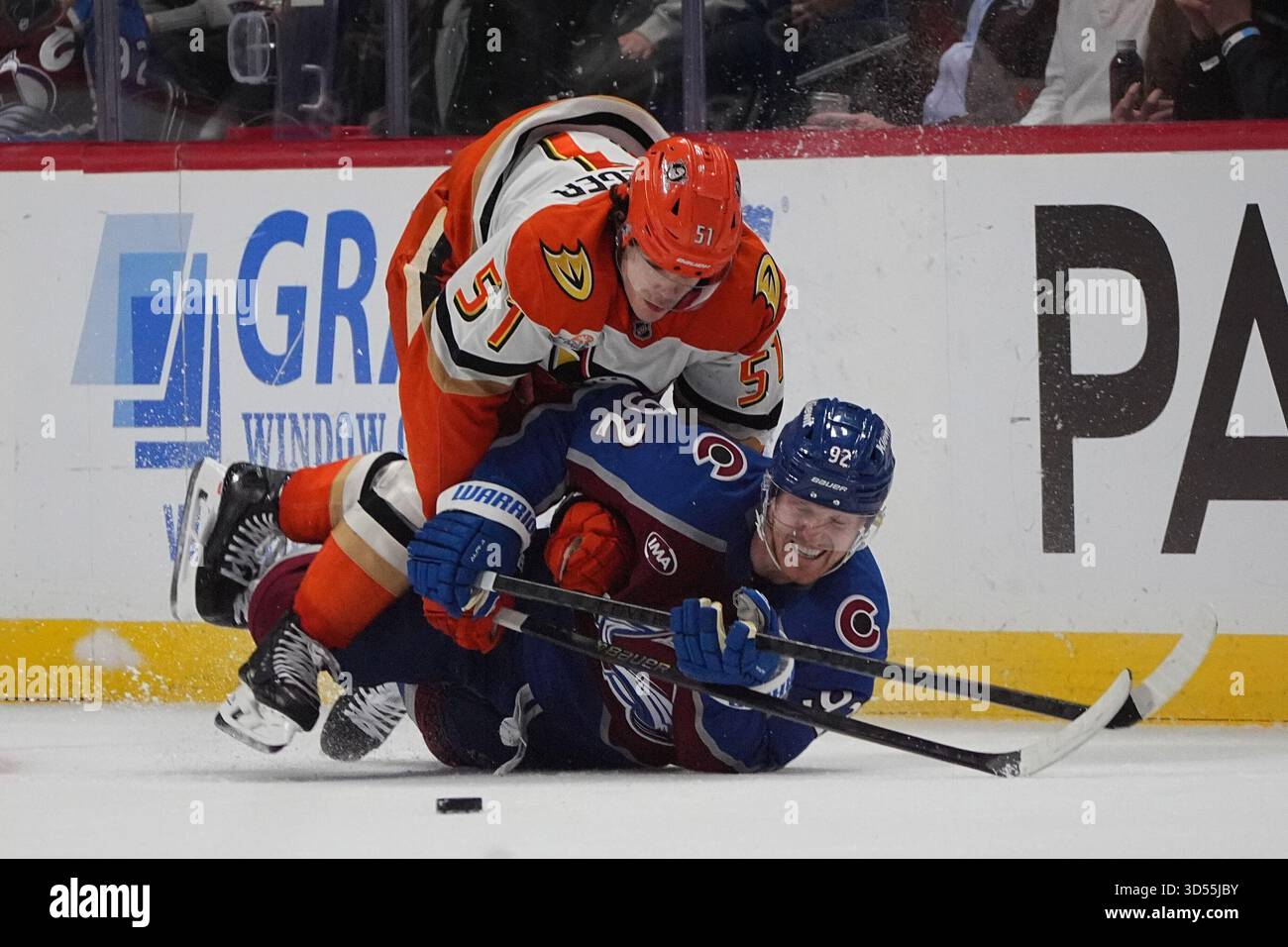 Anaheim Ducks defenseman Olen Zellweger (51) falls on Colorado ...