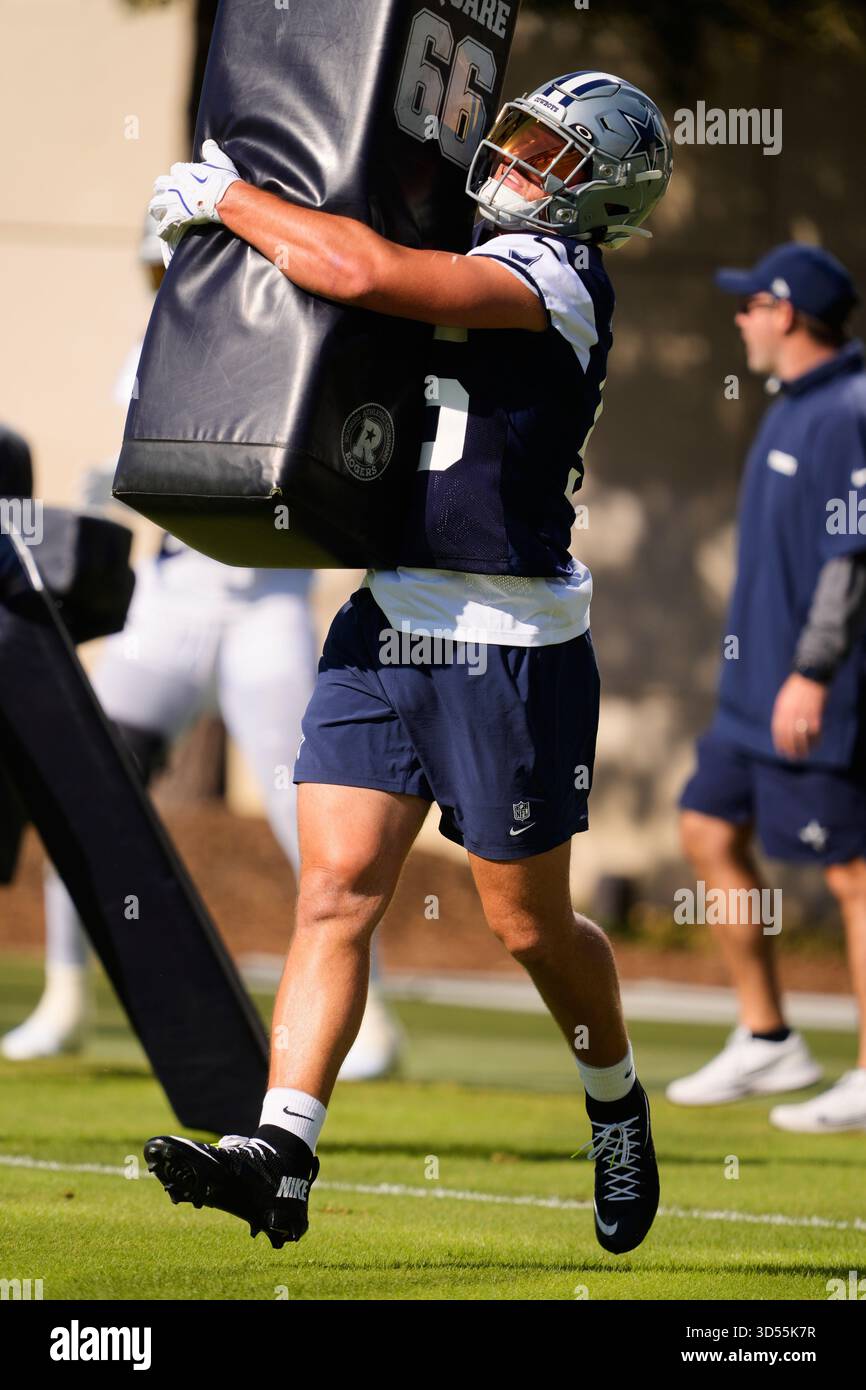 Dallas Cowboys linebacker Logan Wilson runs through a drill during an ...