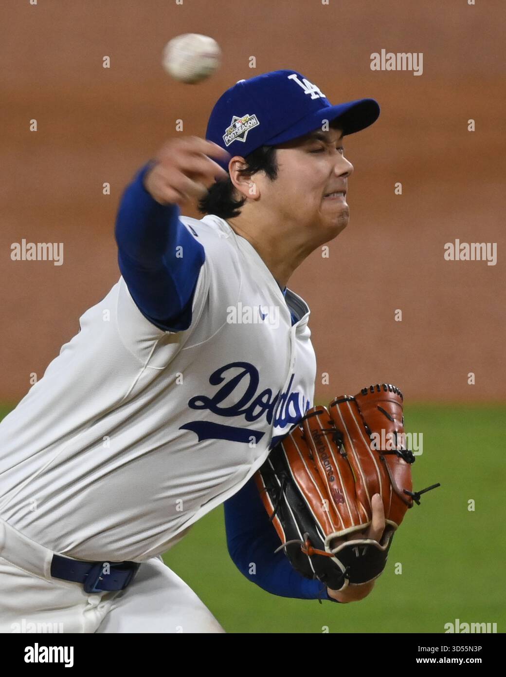 [FILE PHOTO]Los Angeles Dodgers starting pitcher Shohei Otani throws a ...