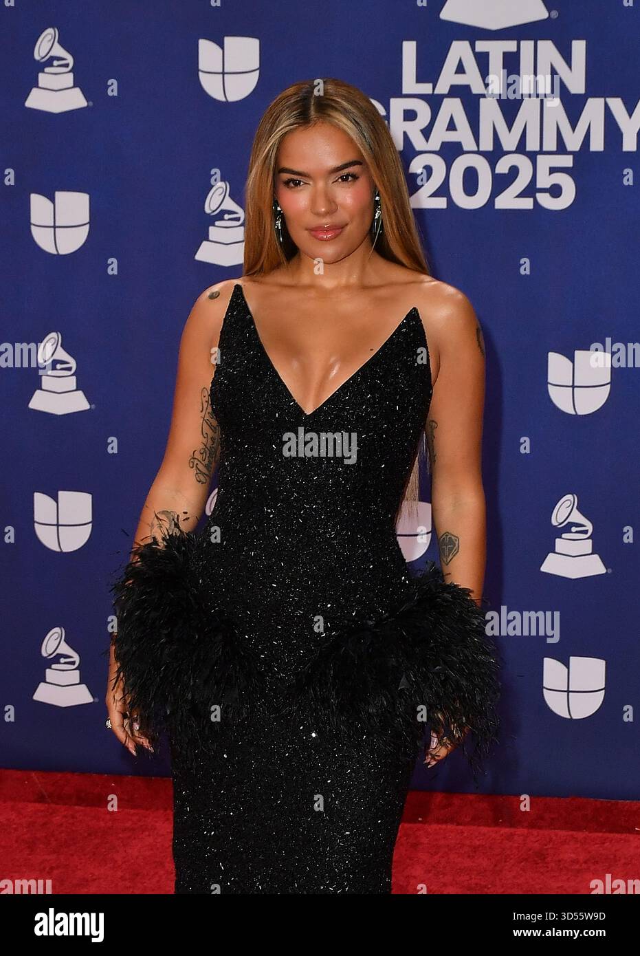 Karol G attends The 26th Annual Latin GRAMMY Awards at MGM Grand Garden ...