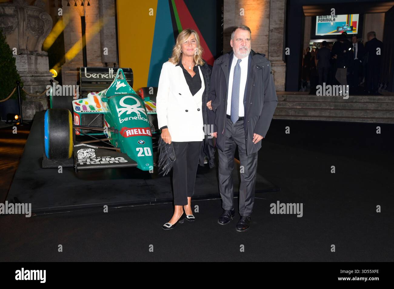 Myrta Merlino (l) and Marco Tardelli (r) attend the Benetton Formula ...