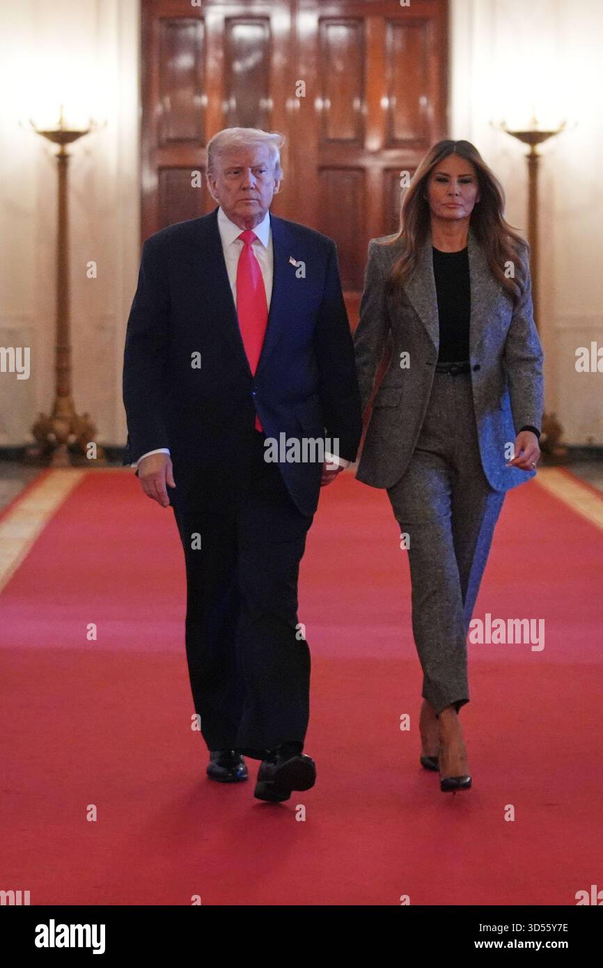 President Donald Trump and first lady Melania Trump arrive to speak ...