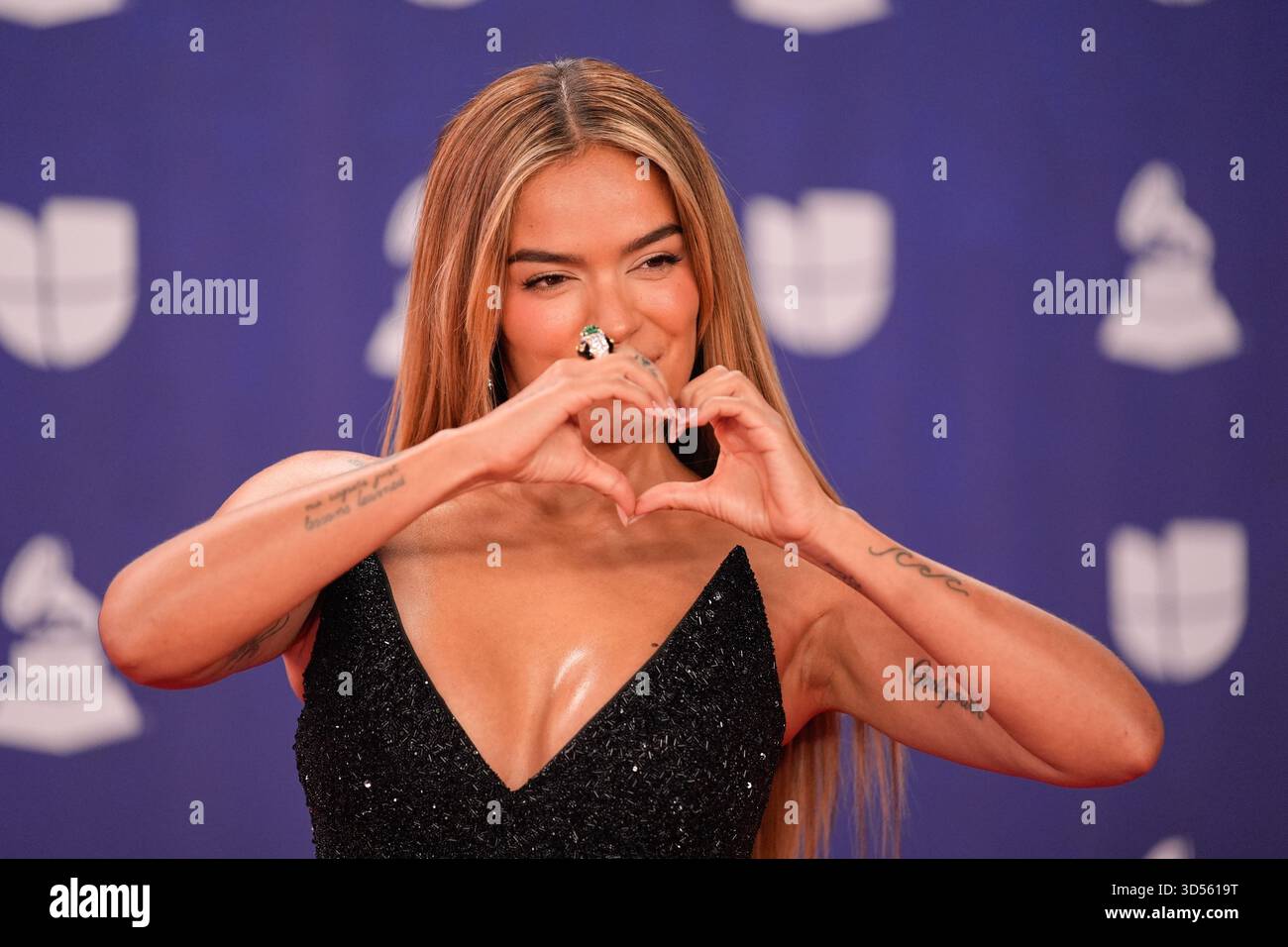 Karol G arrives at the 2025 Latin Grammys on Thursday, Nov. 13, 2025 ...