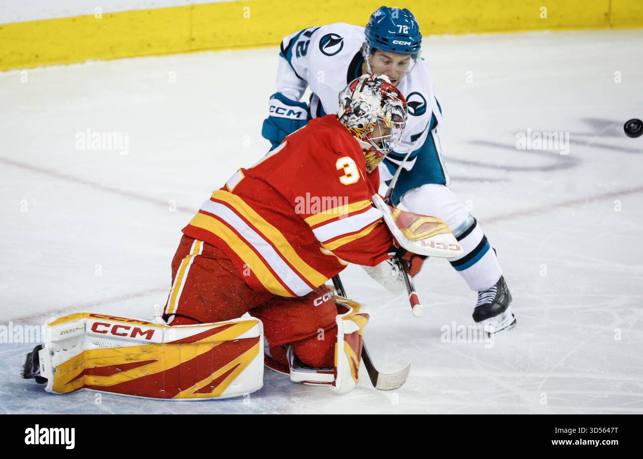 San Jose Sharks' William Eklund (72) has his shot stopped by Calgary ...