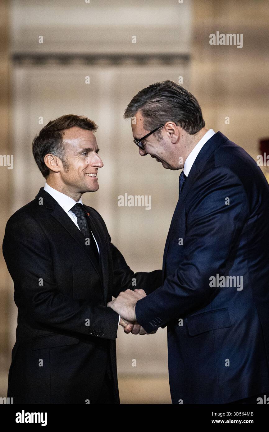 The French President Emmanuel Macron (L) welcomes Aleksandar Vucic (R ...