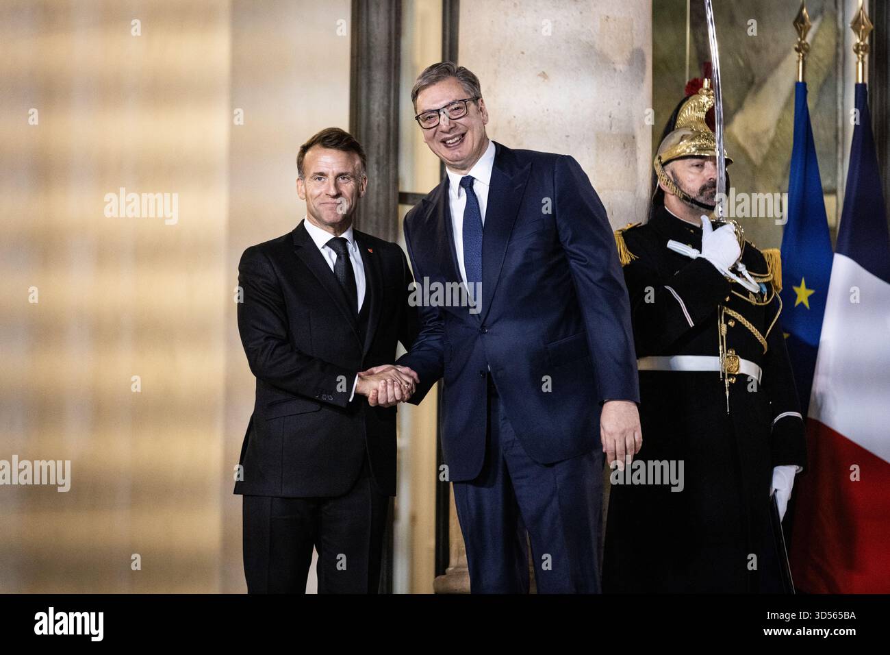 The French President Emmanuel Macron (L) welcomes Aleksandar Vucic (R ...