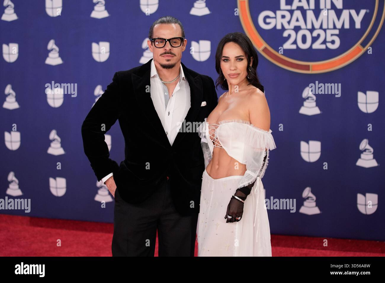 Beau Casper Smart, left, and Michelle Saules arrive at the 2025 Latin ...