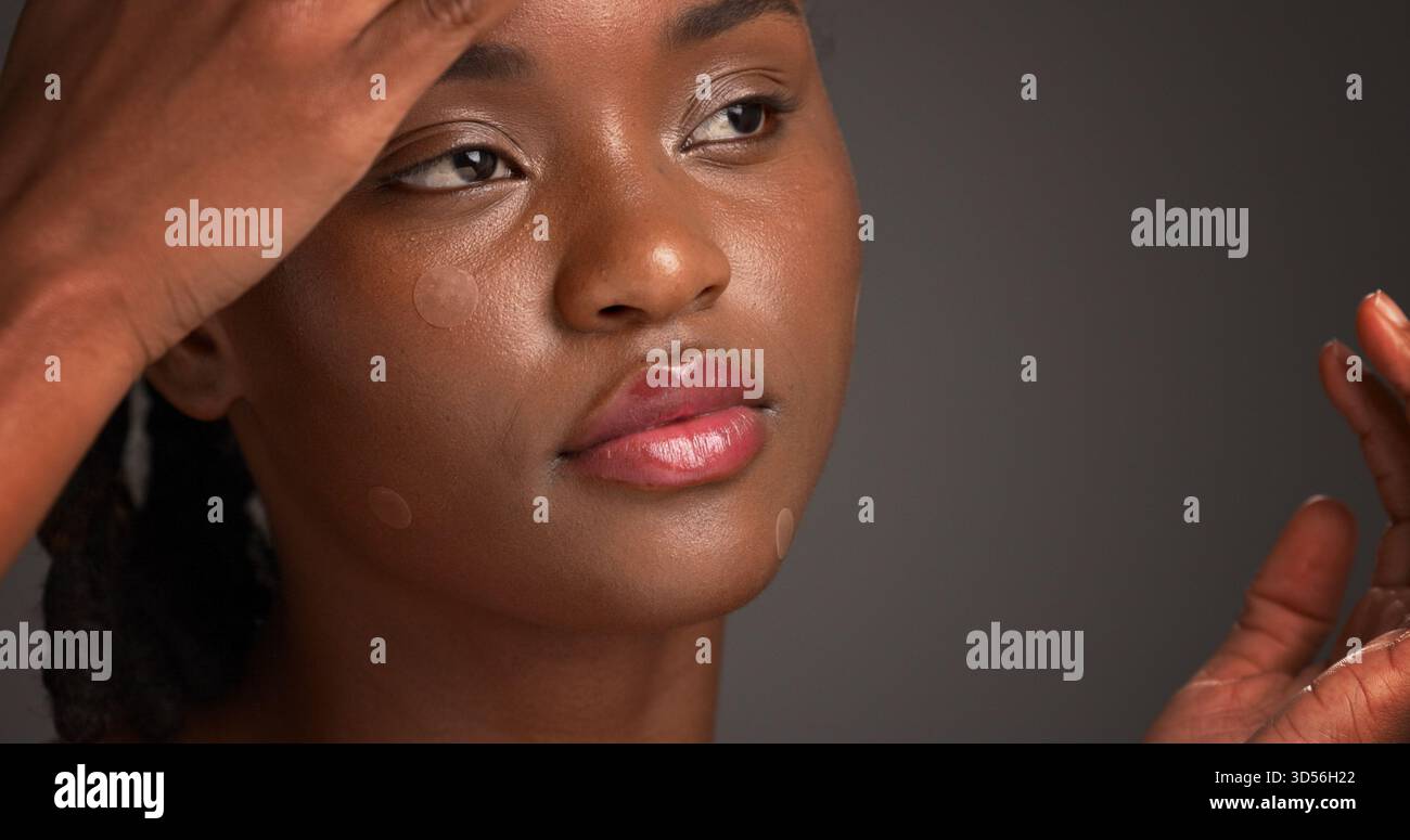 Acne patch, lip gloss and skincare with black woman on studio space for ...