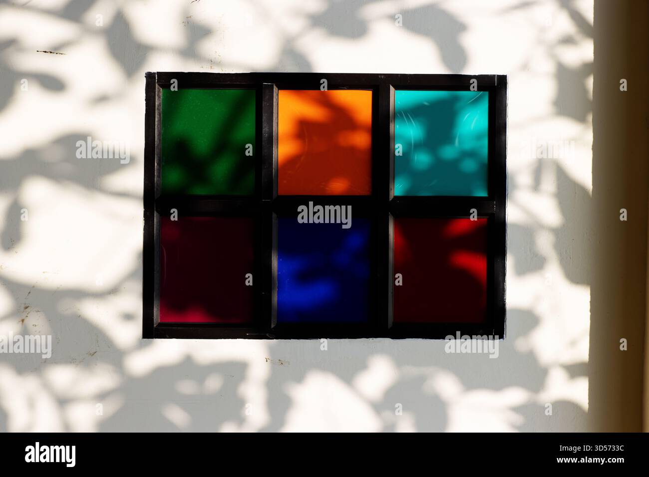 typical Indian coloured window panes in red, blue and green Stock Photo ...