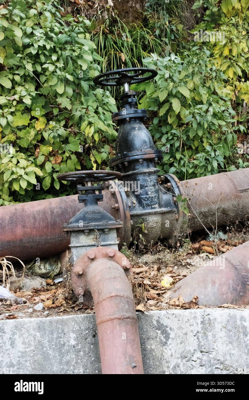Typical large scale metal water suply pipe for the town and homes in ...