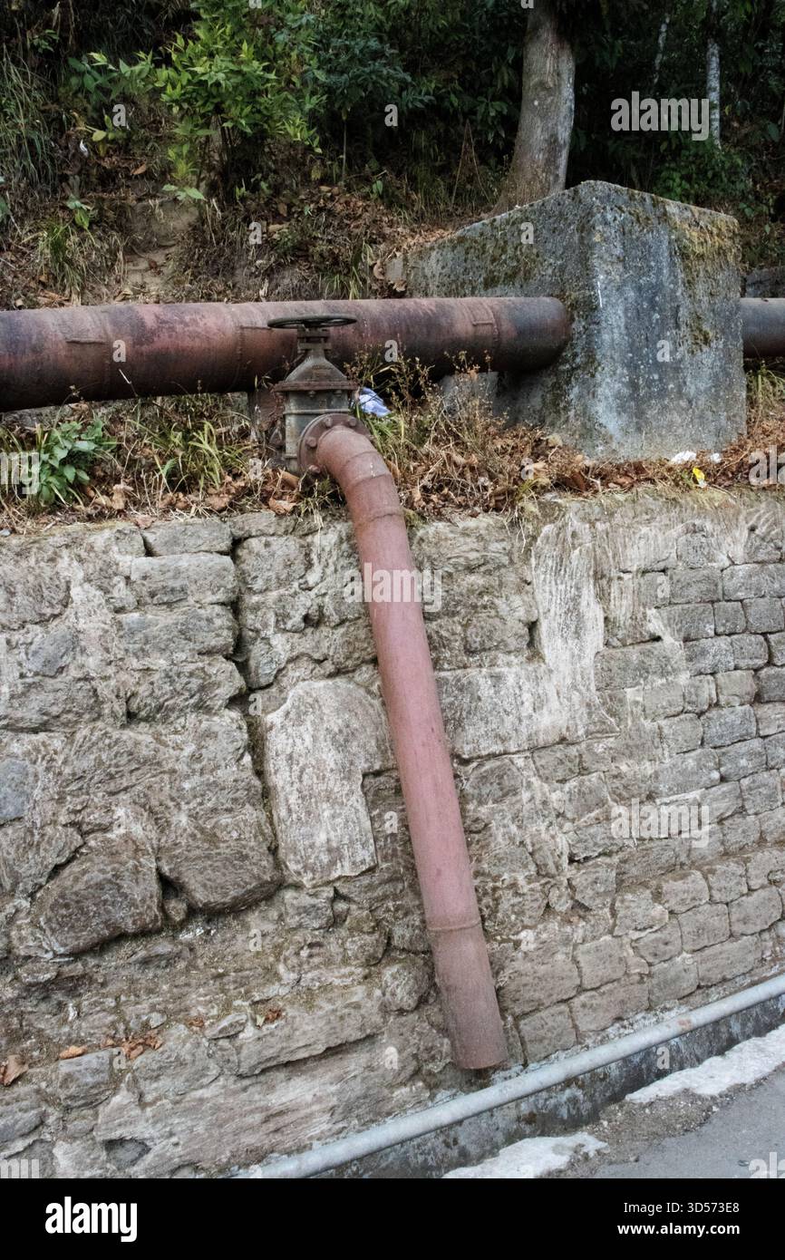 Typical large scale metal water suply pipe for the town and homes in ...