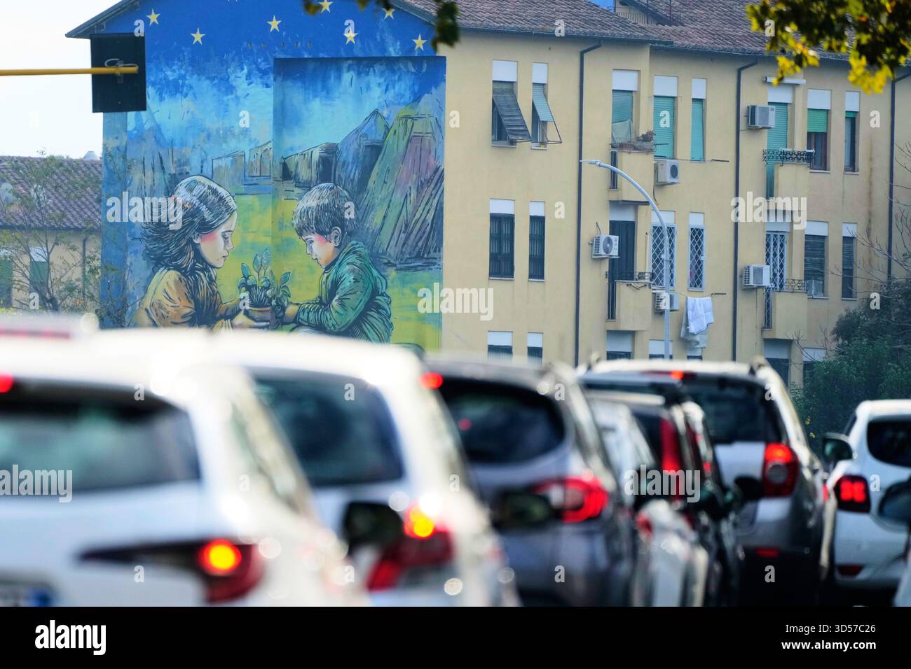 Cars in a traffic jam at a cross roads in Rome, Friday, Nov. 14, 2025 ...