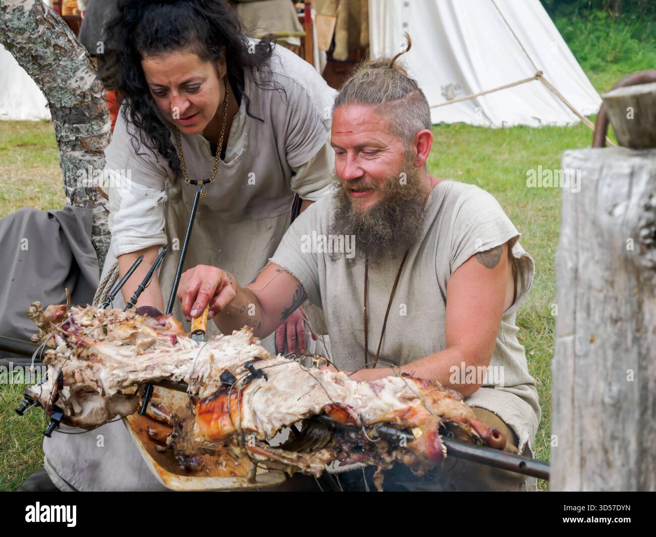 Bøstad, Norway - August 3, 2023: Vikings in medieval folk costumes ...