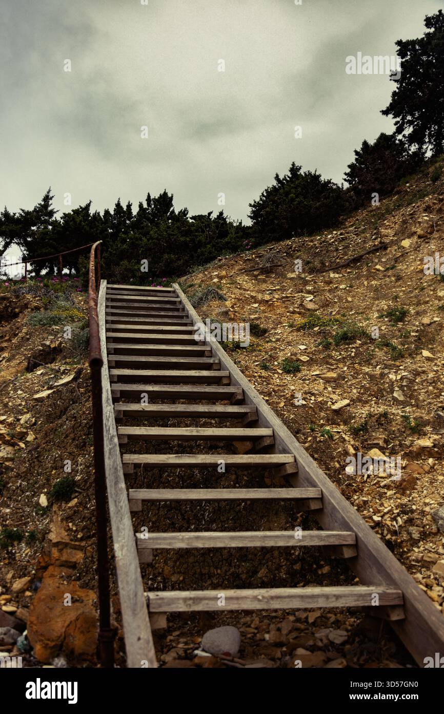 Wooden stairs on a hill vertical landscape Stock Photo - Alamy