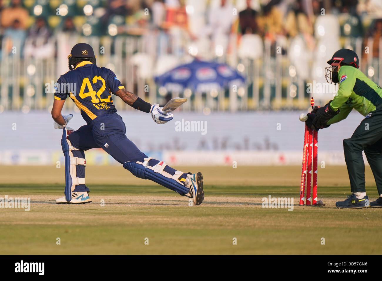 Sri Lanka's Kamil Mishara, left, is stump out by Pakistan's Mohammad ...