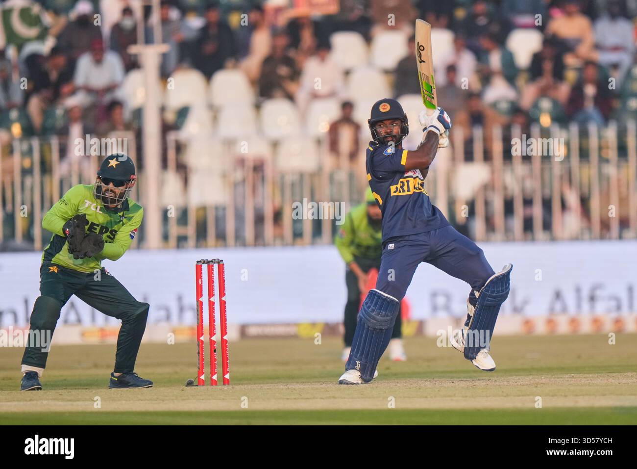 Sri Lanka's Janith Liyanage, right, plays a shot as Pakistan's Mohammad ...