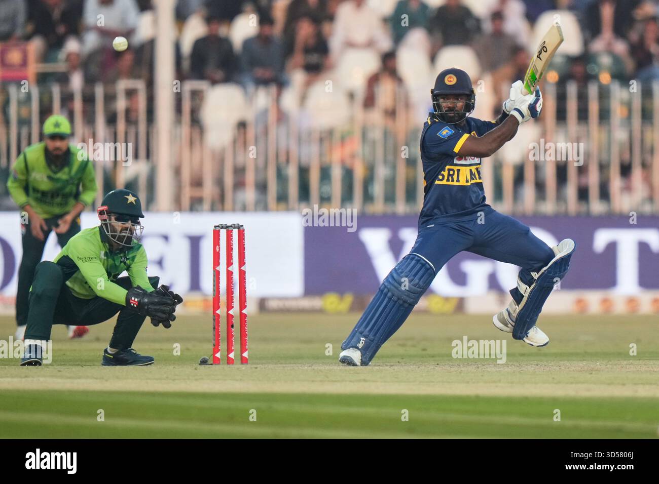 Sri Lanka's Janith Liyanage, right, plays a shot as Pakistan's Mohammad ...