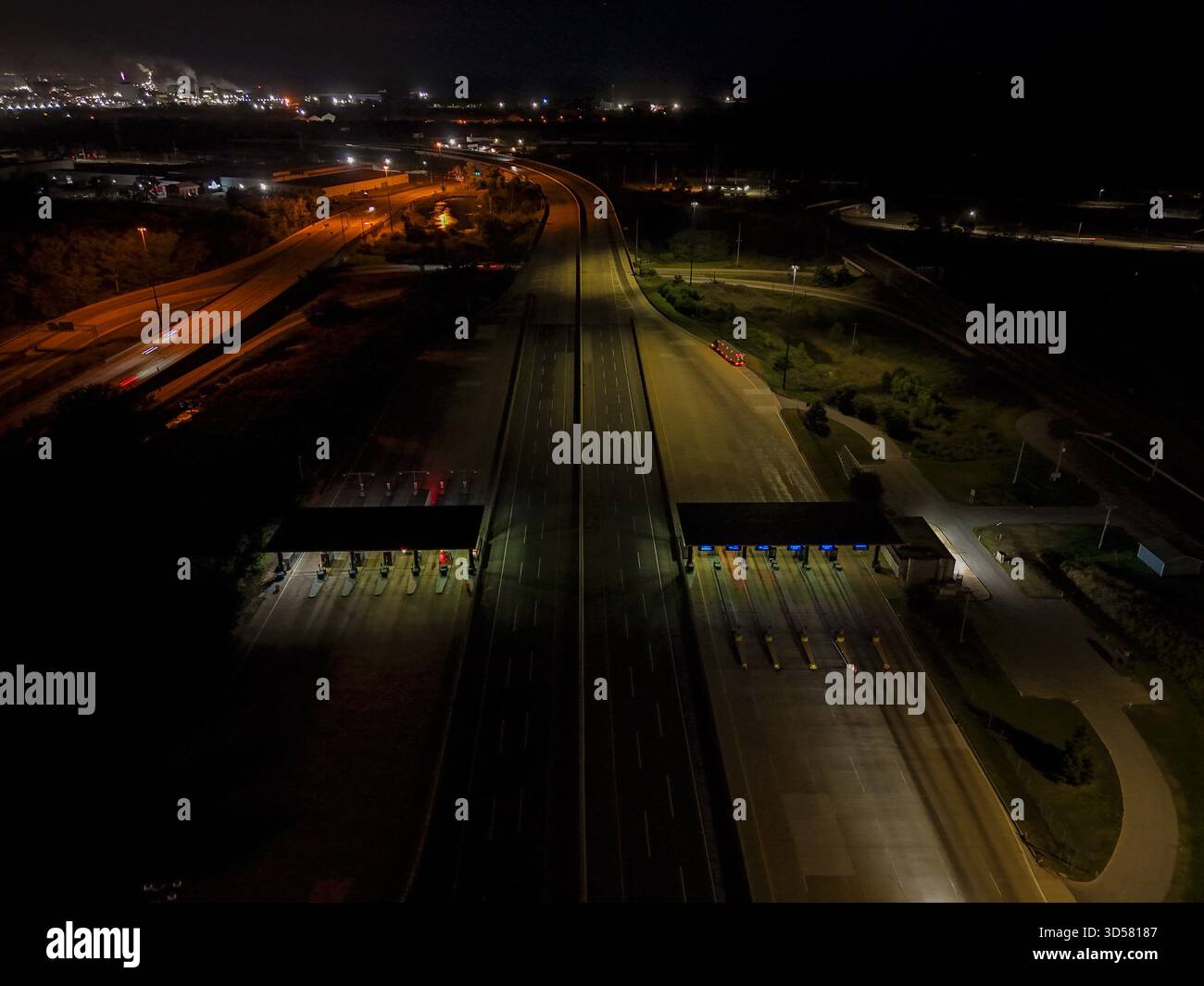 Blurry streaks of light on a busy highway at night, capturing the fast ...
