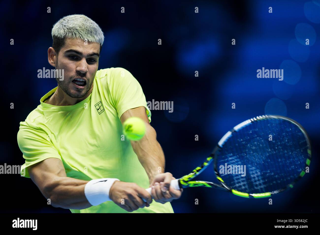 Carlos Alcaraz of Spain plays a backhand during his round robin singles ...