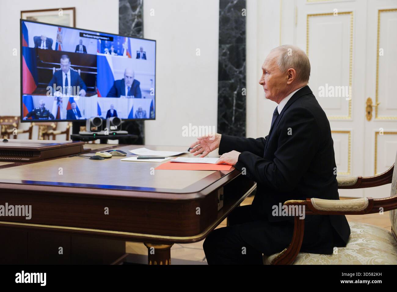 Russian President Vladimir Putin chairs a Security Council meeting via ...