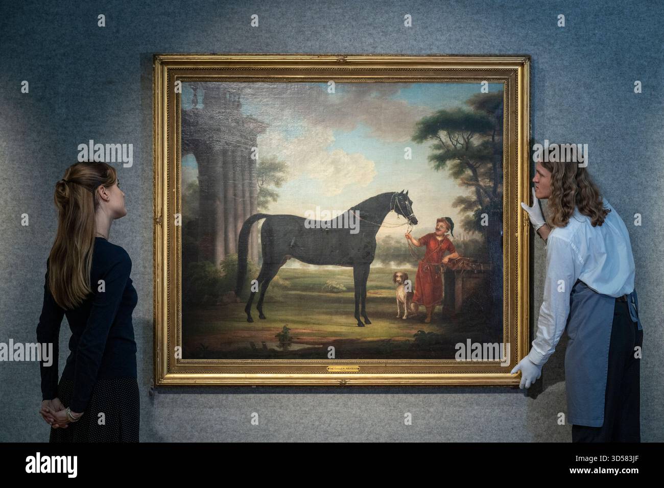 London, UK. 14 November 2025. Staff members with Thomas Smith of Derby ...