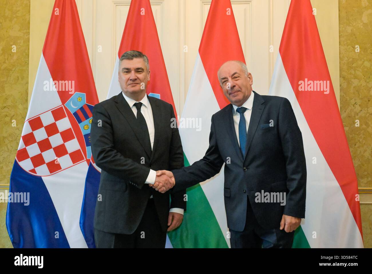 Hungarian President Tamas Sulyok, right, welcomes Croatian President ...