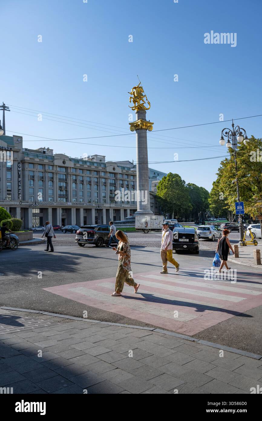 Georgia freedom Square or Liberty Square seen with an iconic statue of ...